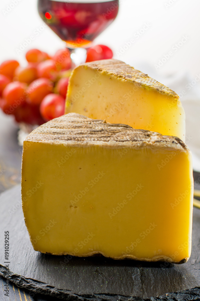 Tasting of ancient french demi soft cheese Tomme from French Alps, made ...