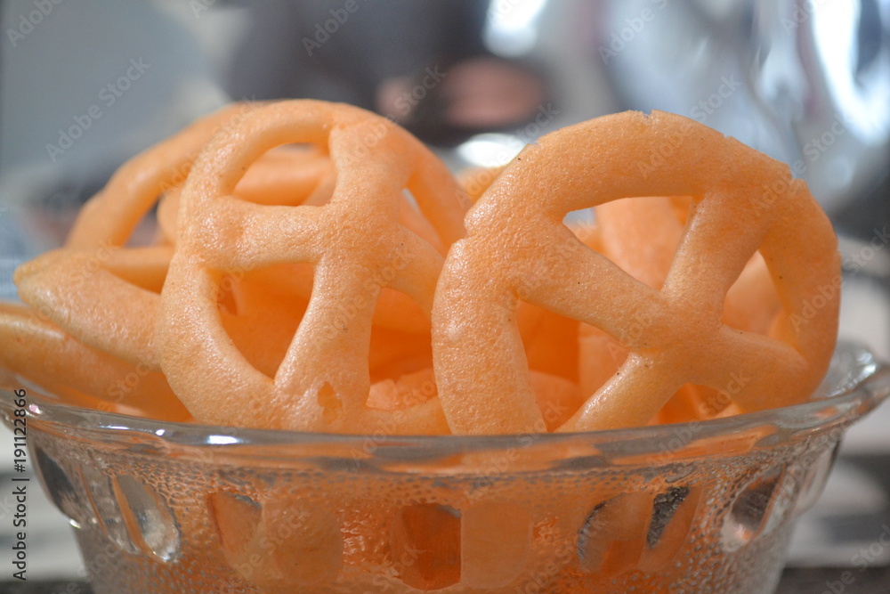 Frituras de harina en forma de rueda Stock Photo | Adobe Stock