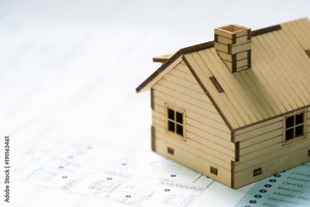 Miniature house model with house layout plan Stock Photo | Adobe Stock