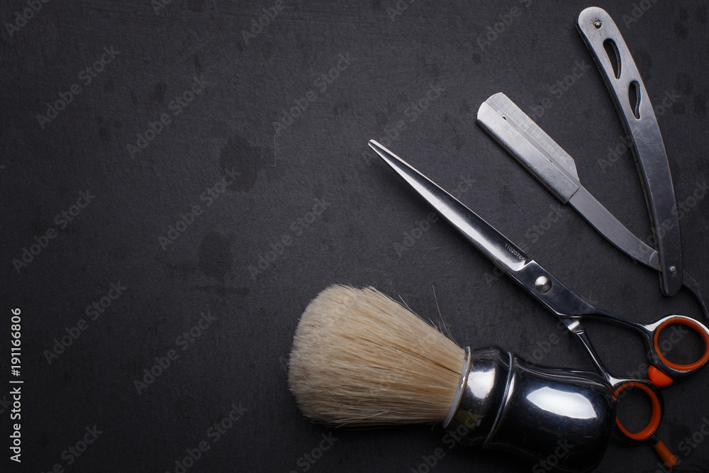 Vintage tools of barber shop on black background Stock Photo | Adobe Stock