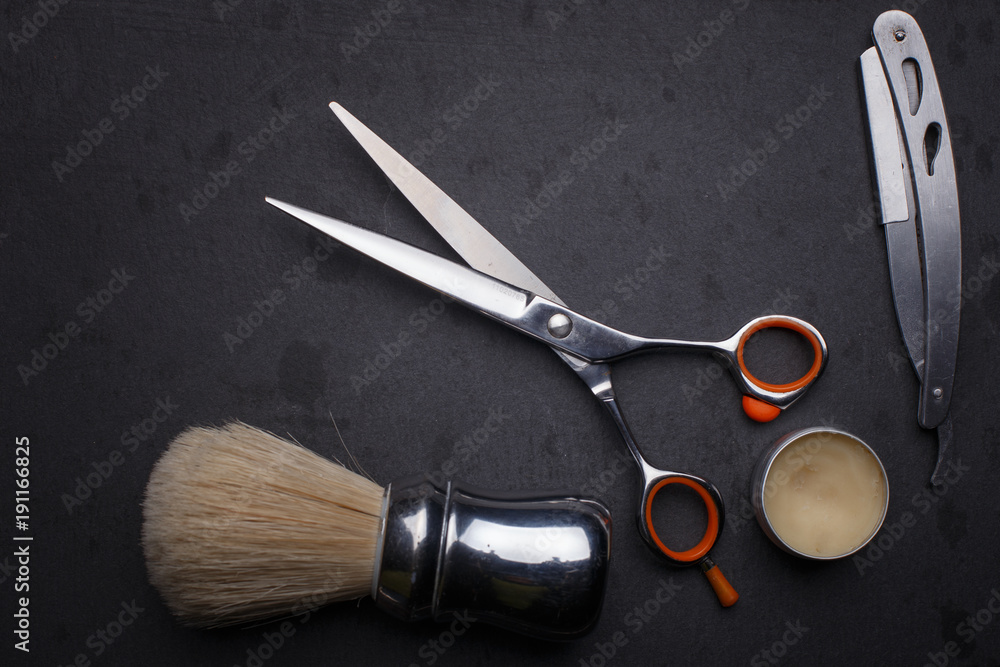 Vintage tools of barber shop on black background Stock Photo | Adobe Stock