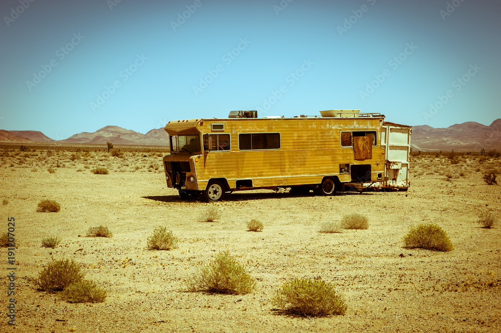 Abandoned RV camper van in the scenic landscape of the mojave desert ...