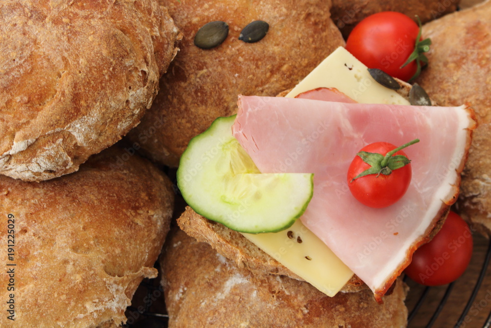 Belegtes Brötchen mit Wurst Stock-Foto | Adobe Stock