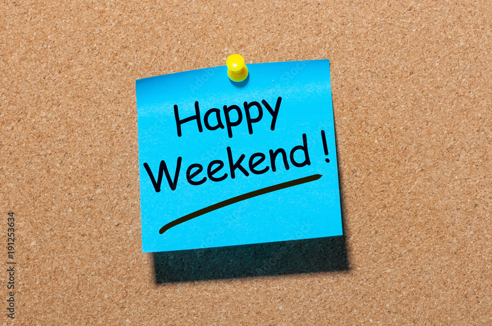 Work place concept - Office Desk pinned Notes About Happy Weekend. Have ...