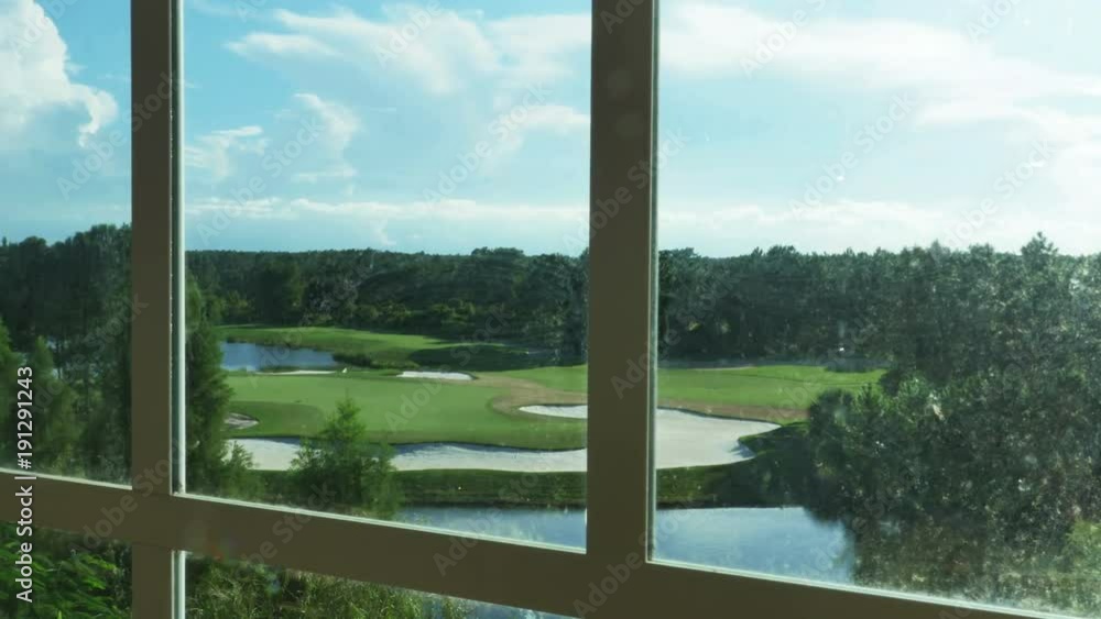 Golf Course Through Window with Ponds Wide Time Lapse Stock ビデオ | Adobe ...