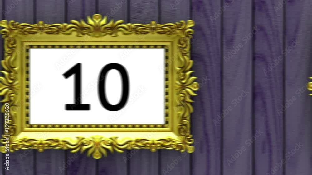 Countdown in gold picture frames on purple wood background. Mock-up for ...