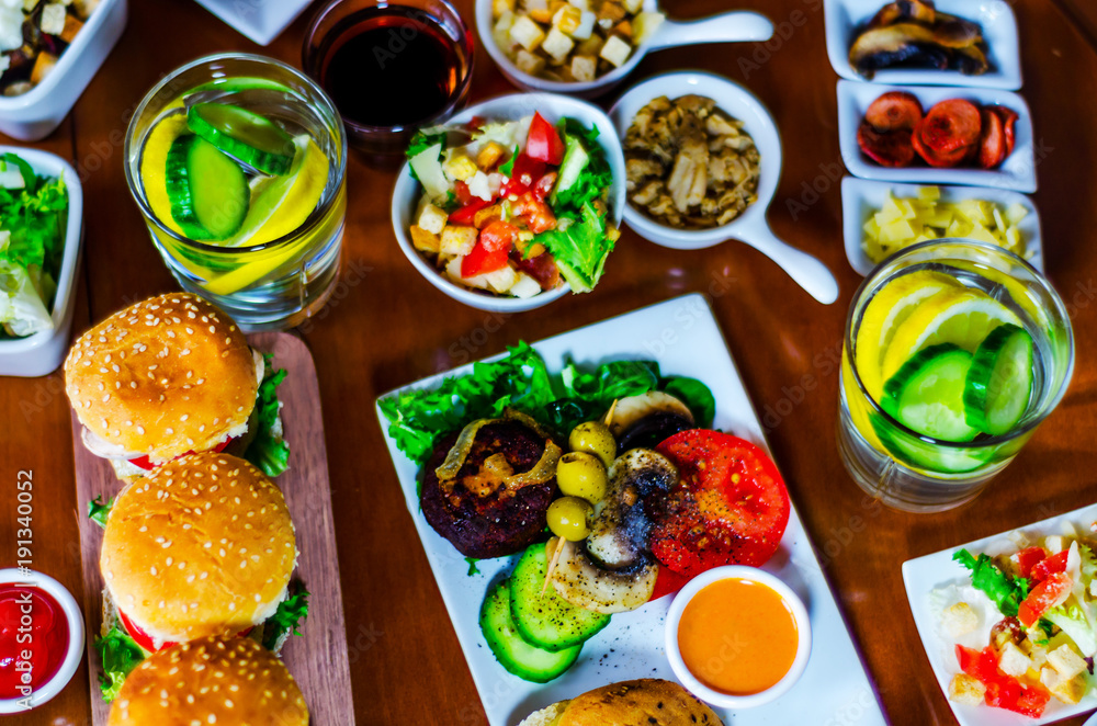 mini burgers with meat, vegetables, cheese and other toppings, bread ...