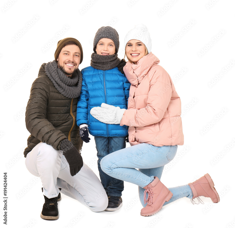 Happy family in warm clothing on white background. Ready for winter ...