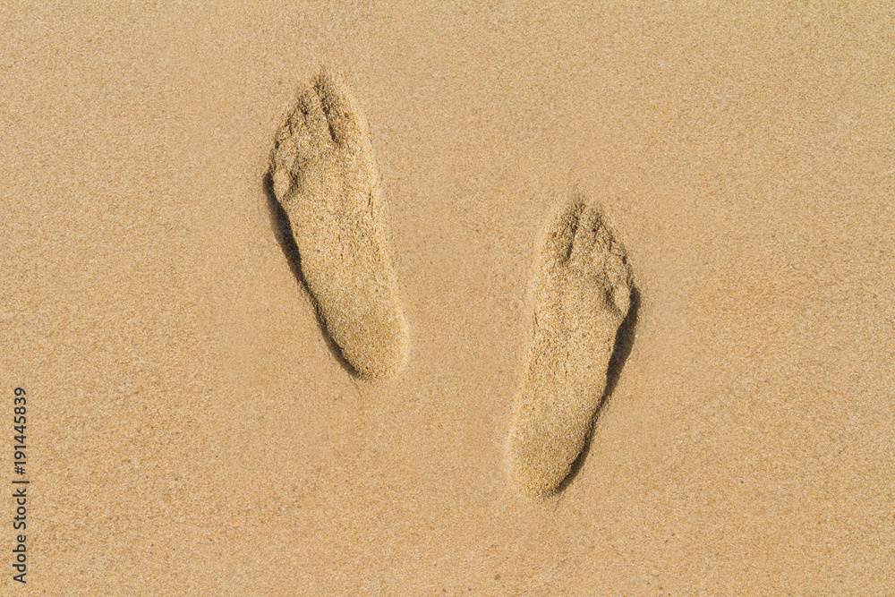 Sign of Foot Print Shape on Sand Stock Photo | Adobe Stock