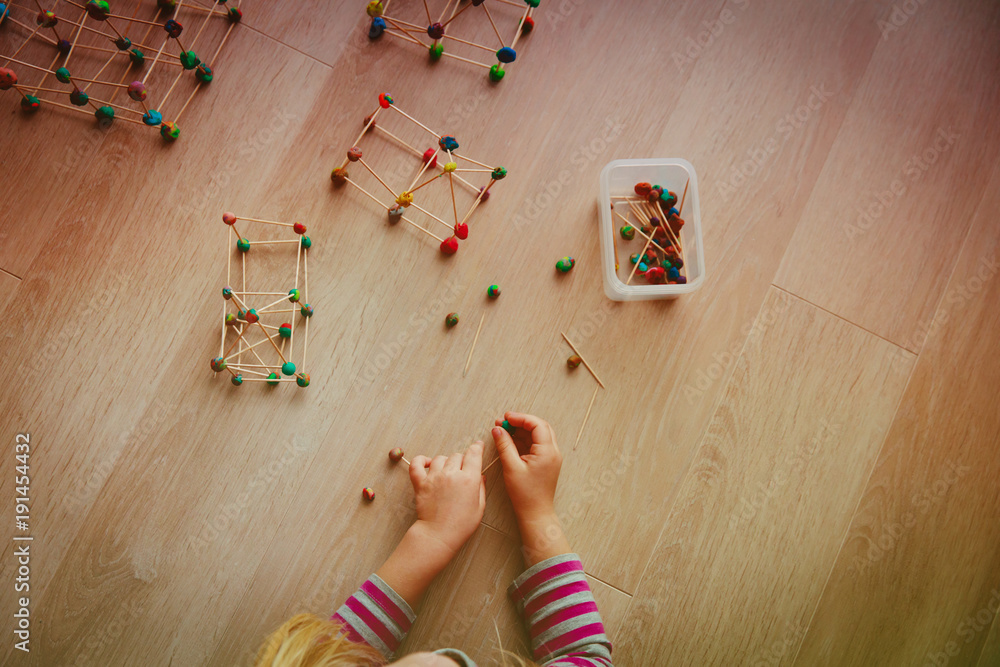 little girl making geometric shapes, engineering and STEM education ...