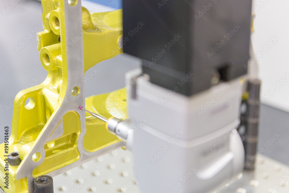 The multi-axis coordinate Measuring Machine, CMM prob measures the work ...