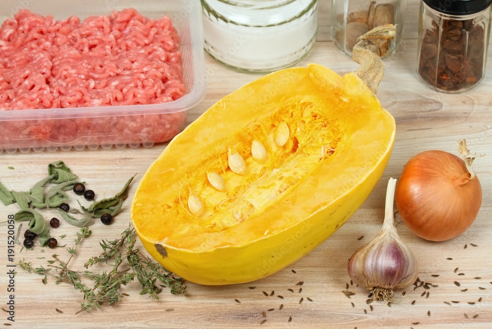Raw spaghetti squash cut in half prepared for stuffing. Ripe anf fresh ...