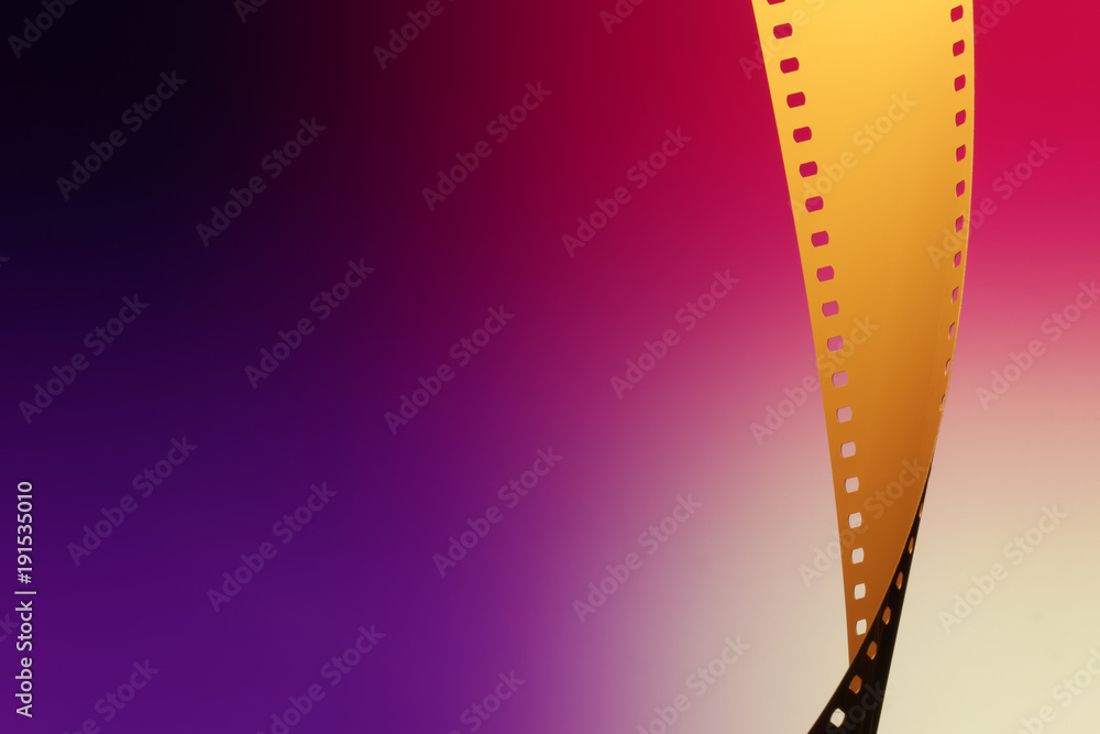 Camera negative film. Selective focus on film perforation. Unprocessed ...