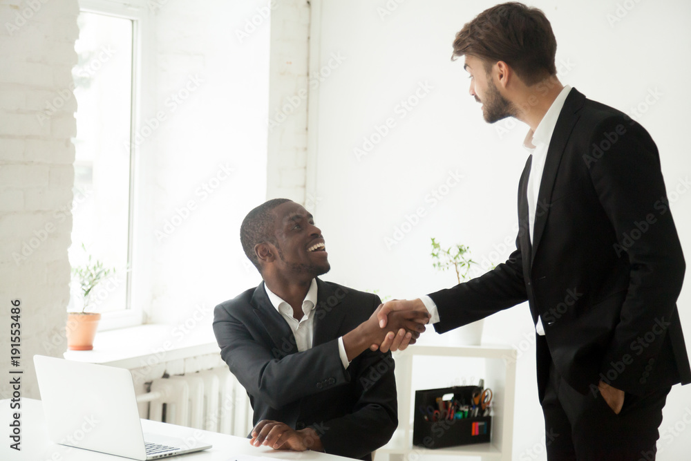 Employer And Employee Shaking Hands
