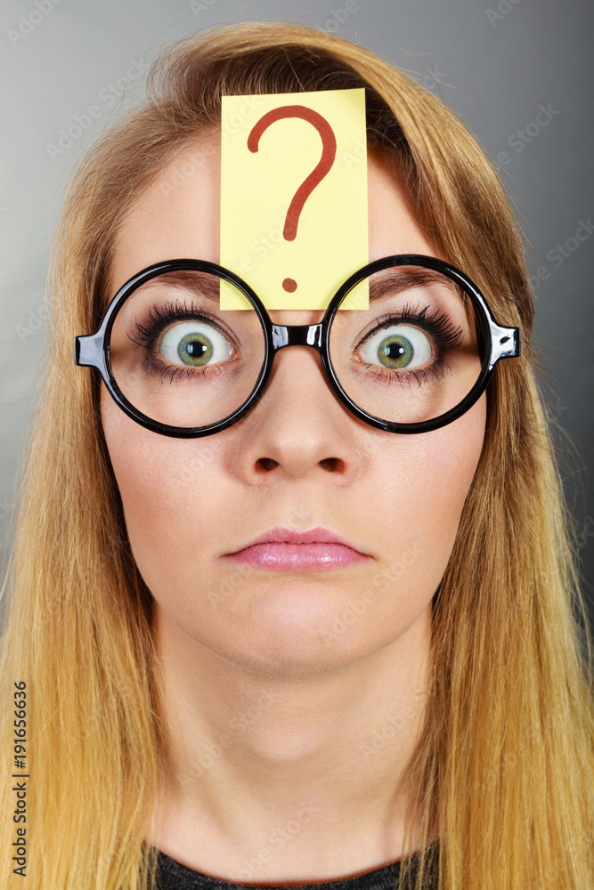 Weirdo nerd woman having question mark on forehead Stock Photo | Adobe ...