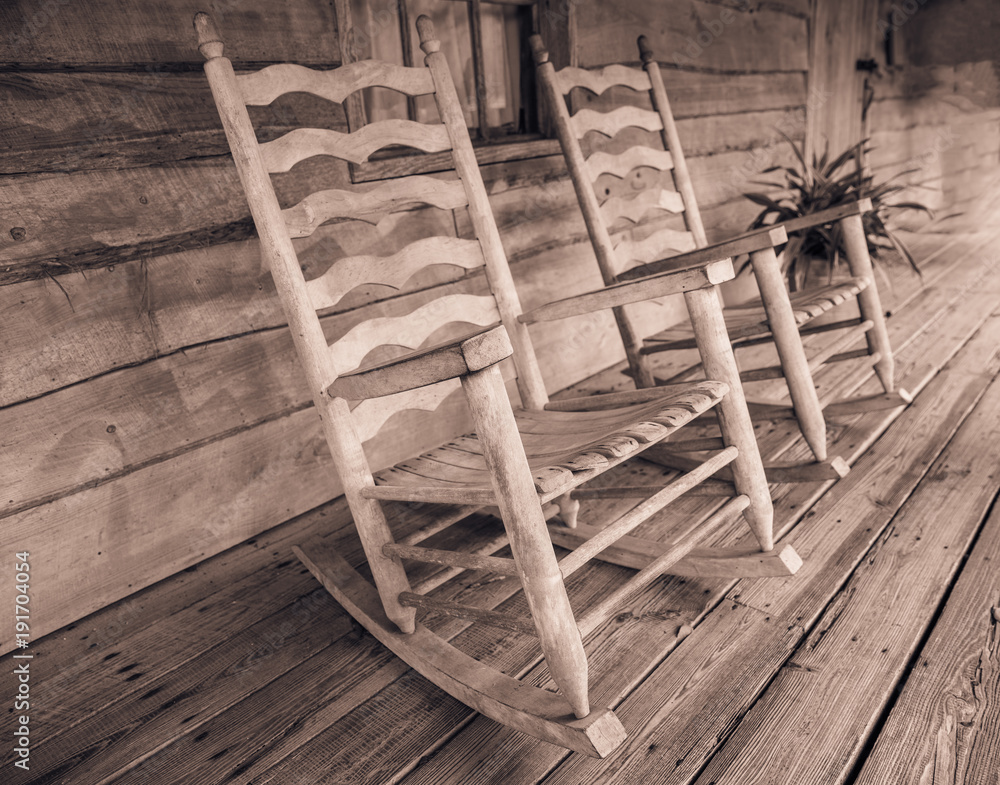 vintage rocking chair is empty and waiting for you on the porch Stock ...