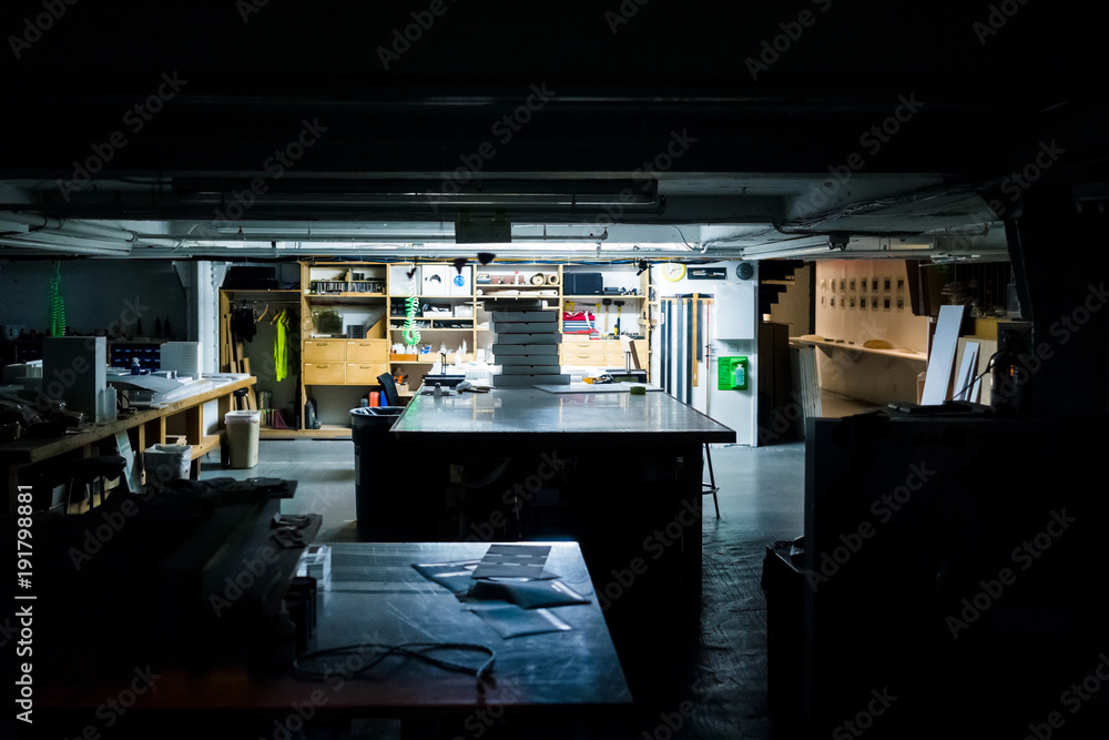 Urban dark evening night illuminated office art studio room with light ...