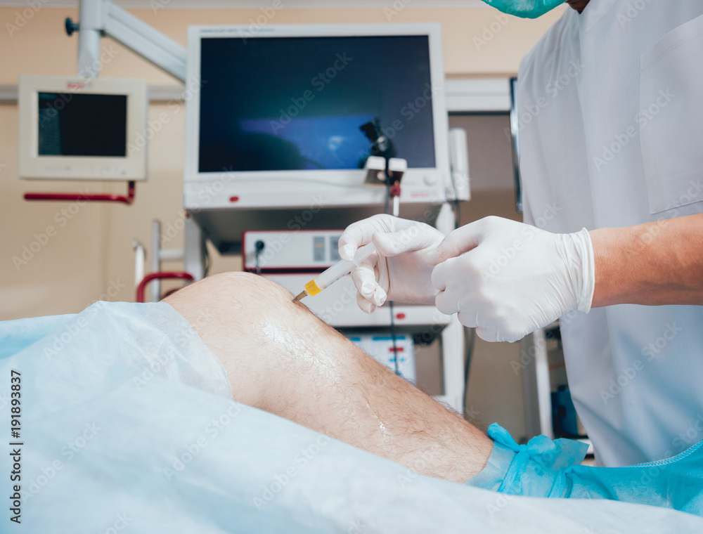 Platelet-rich plasma injection of the knee Stock Photo | Adobe Stock