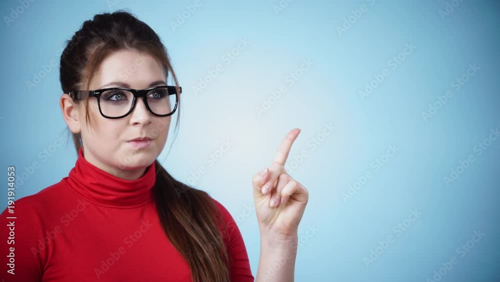 Young woman say no by shaking head, wagging her finger, rejecting ...