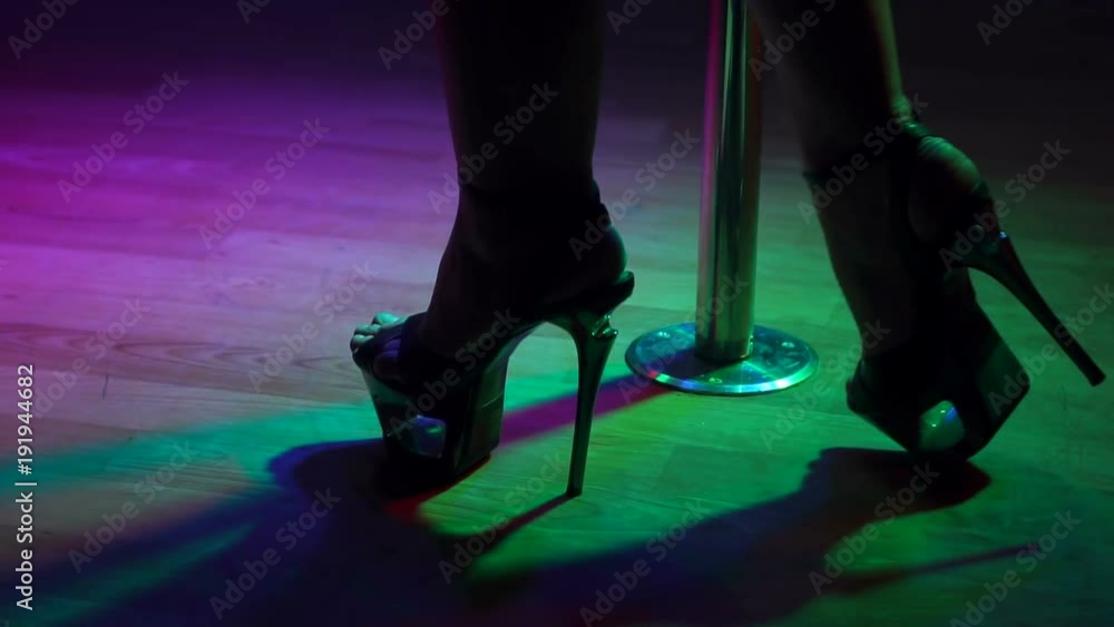 Slender Legs Of Pole Dancer In High Heels Close Up Close Up Of Stripper Shoes In The Club