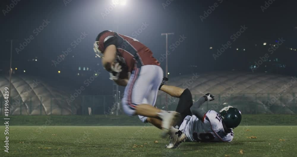 American football player tackles opponent Stock Video | Adobe Stock