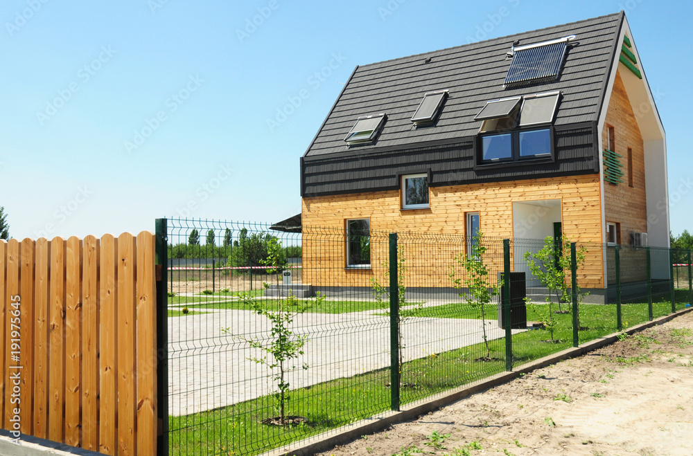 Passive House Concept. Modern house with insulation, wooden walls ...