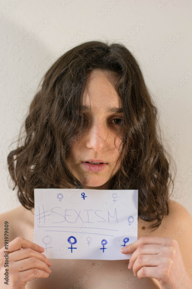 Girl With A Paper Where Is Written Sexism Girls Against Inequality