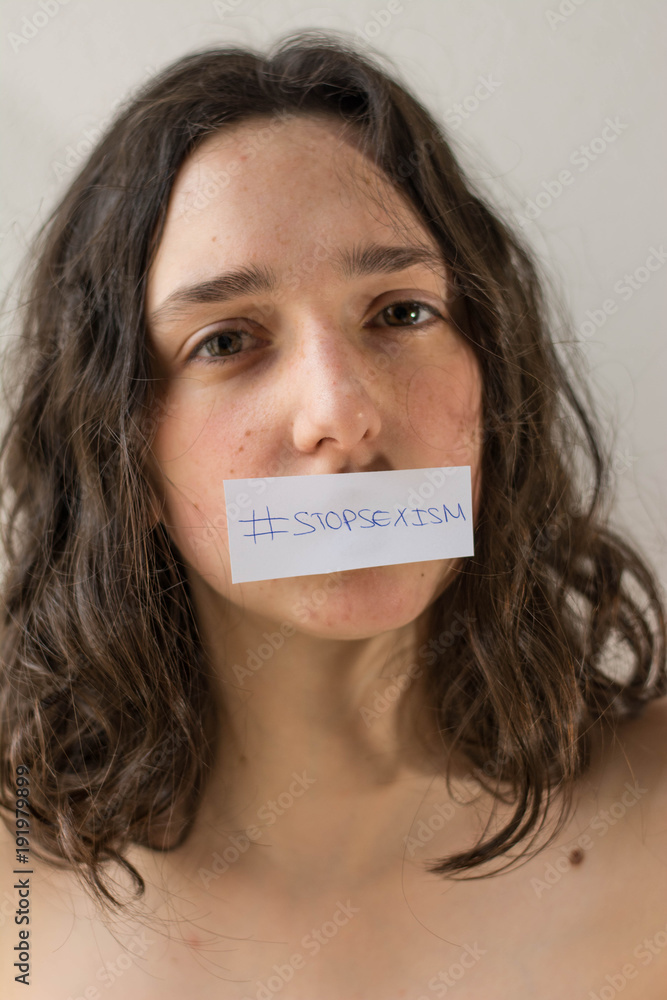 Girl With A Paper Where Is Written Stop Sexism Girls Against 9072
