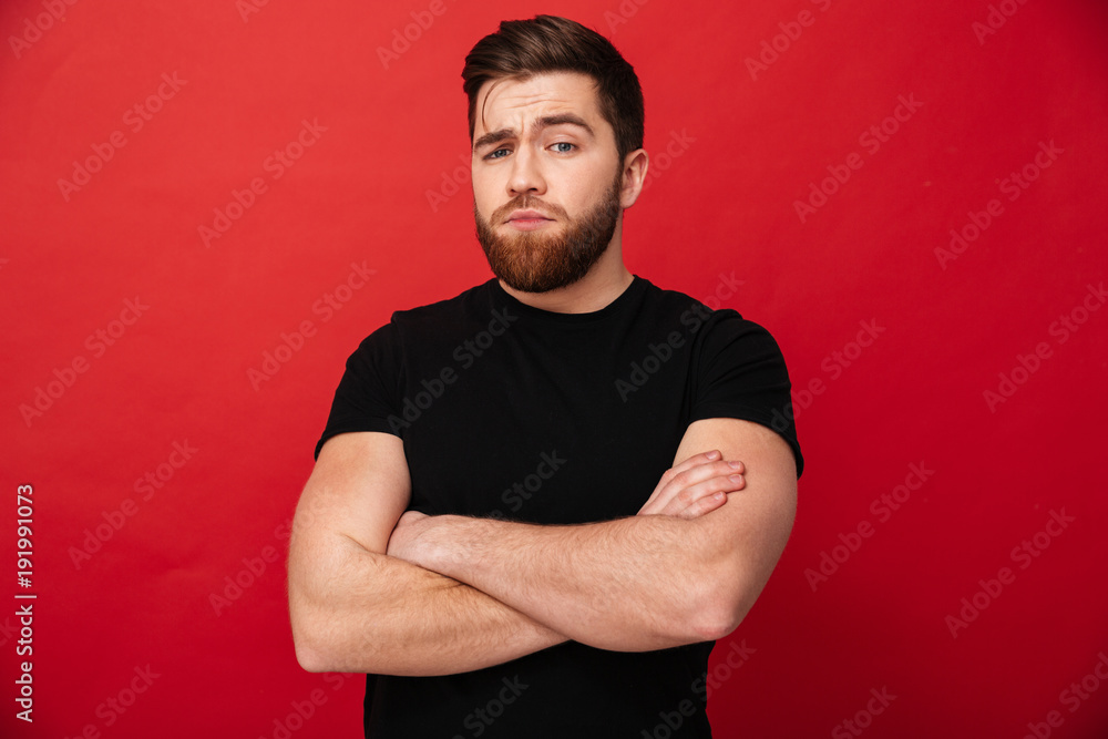Portrait of muscular serious man 30s wearing black t-shirt posing on ...