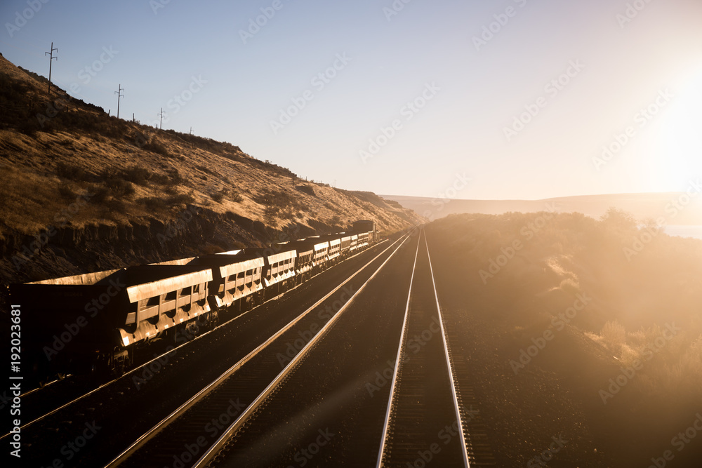 Views of train tracks and cars from a train. Stock Photo | Adobe Stock