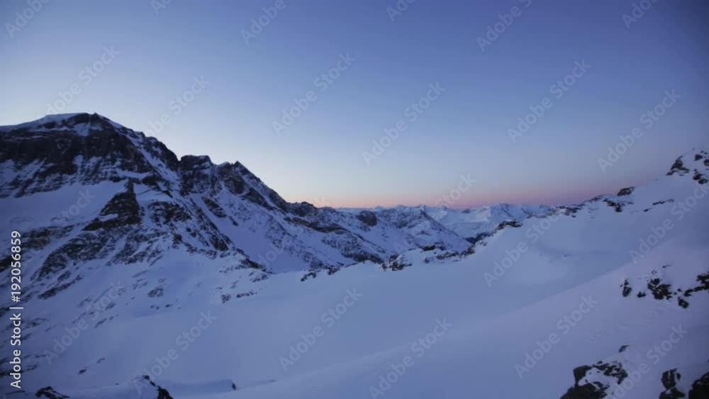 Pan right, vast Swiss Alps at sunrise Stock Video | Adobe Stock