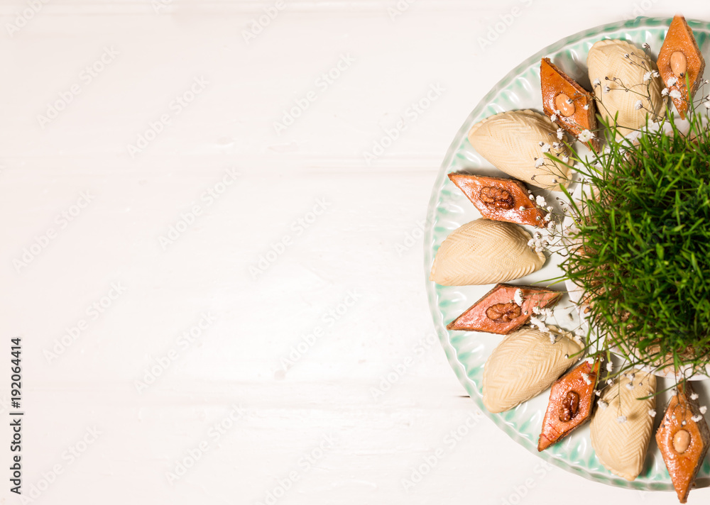 Novruz celebration plate with traditional national pastries in ...