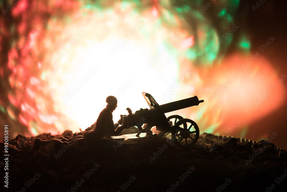 Man with Machine gun at night, fire explosion background or Military ...