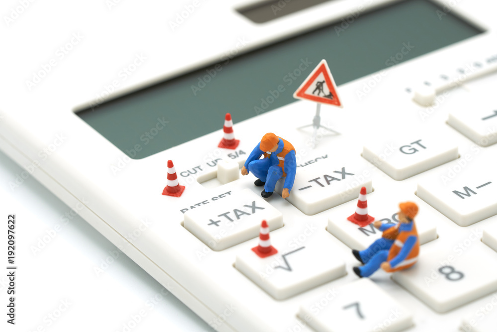 Miniature people Construction worker Keypad TAX button For tax ...