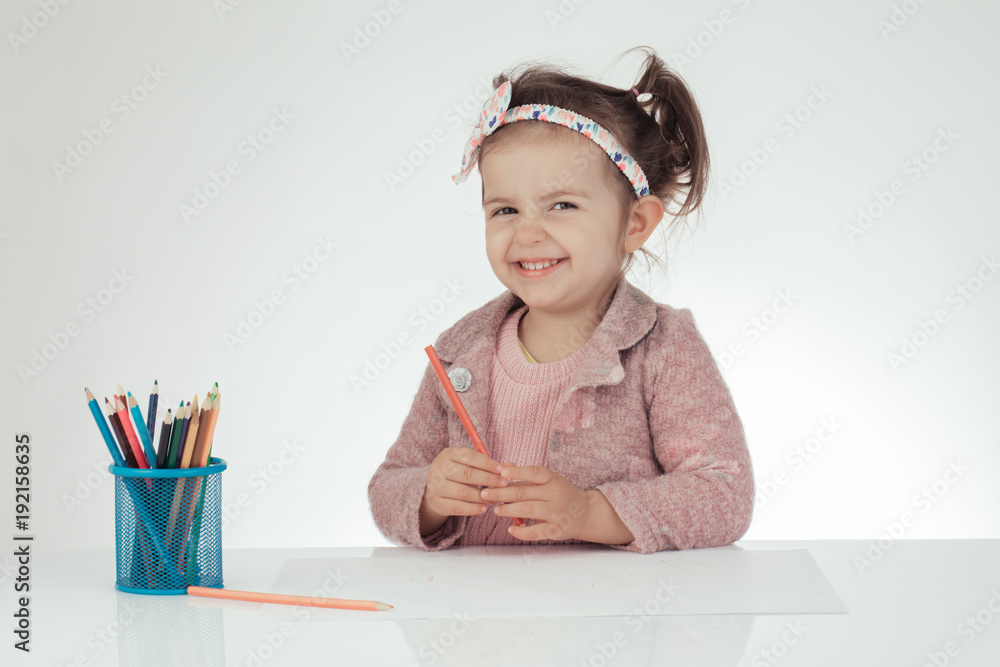 Cute little girl learn to draw. Education. School. Montessori. Stock ...
