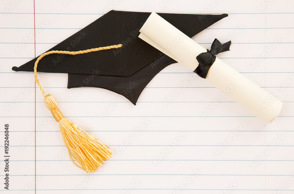 Symbols Representing Graduation on Ruled Notebook Paper Stock Photo ...