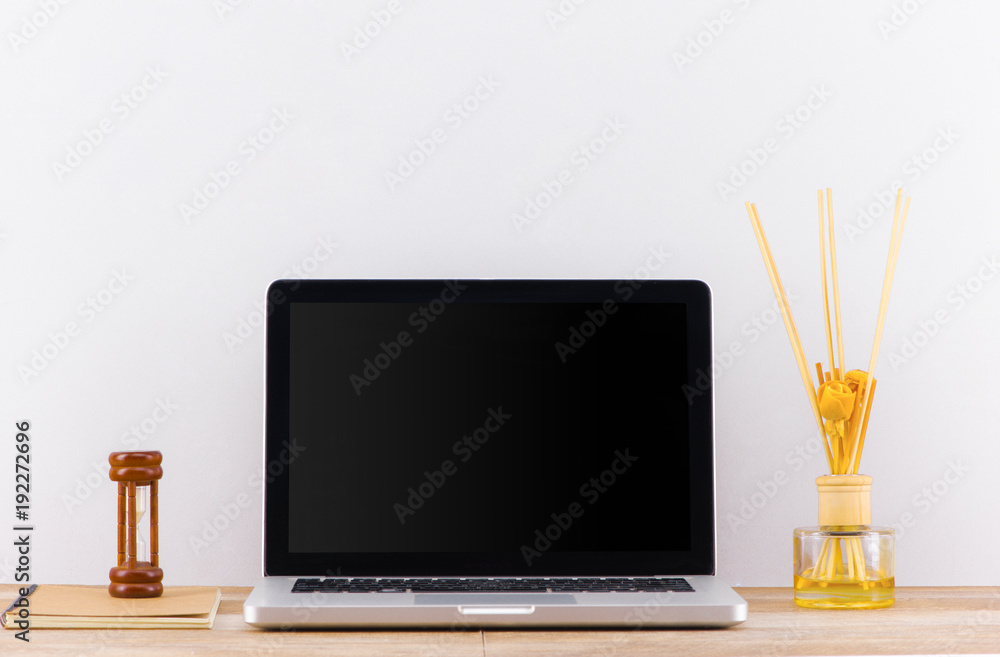 laptop computer white blank screen on work table front view Stock Photo ...