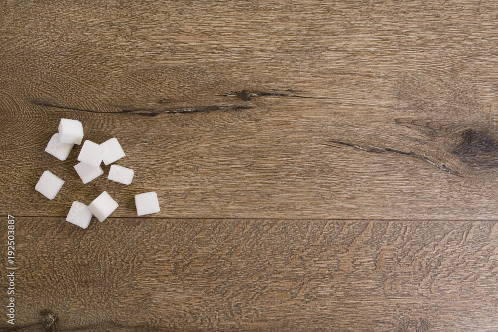 lumb sugar, Zuckerwürfel auf braunem Holzhintergrund Stock-Foto | Adobe ...