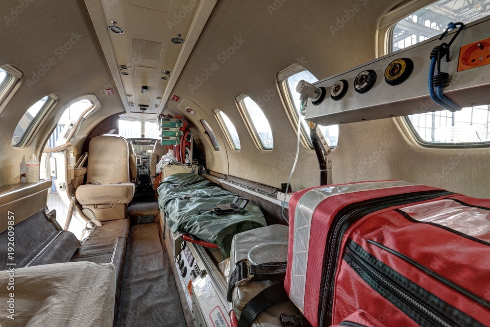 Interior of the ambulance jet with cockpit in background Stock Photo ...