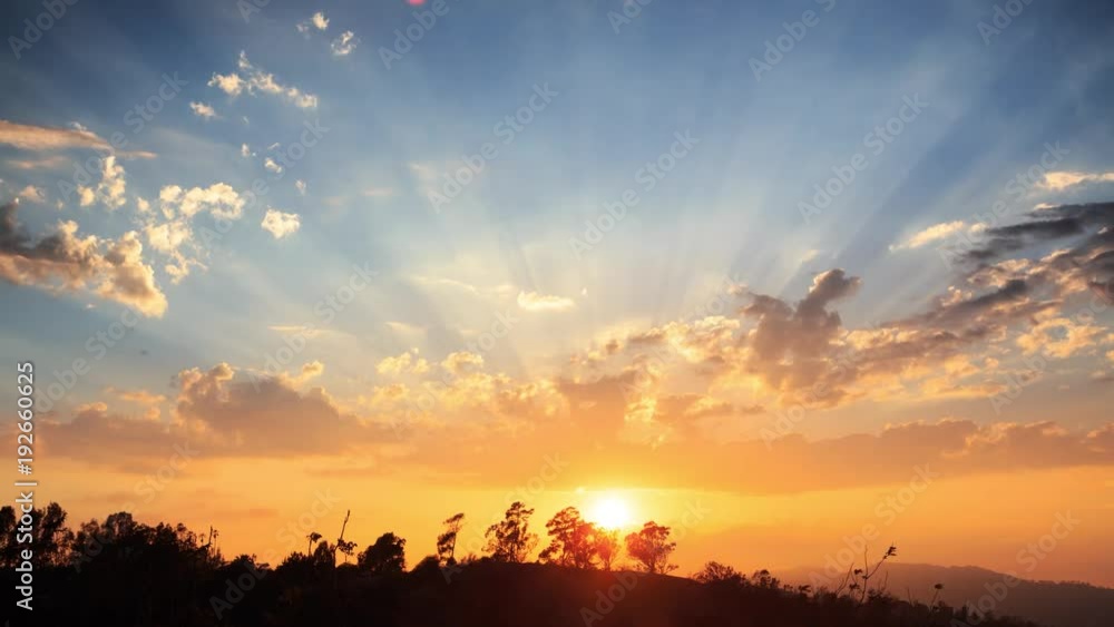 Beautiful scenic sunset with rays of sun shining through clouds 4K UHD ...