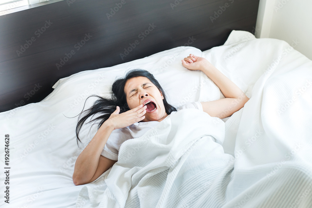 Yawning Asian Woman