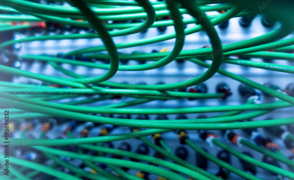 Acoustic audio cable server. Green audio cable. Many acoustic cables ...