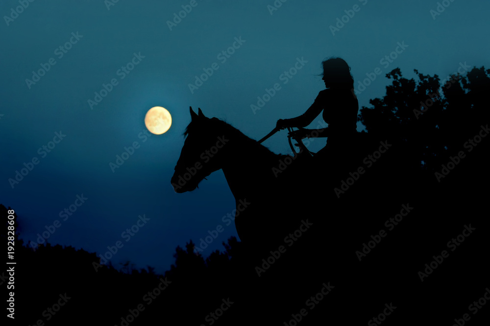 Full moon with silhouette of horse rider night sky, horror concept in ...