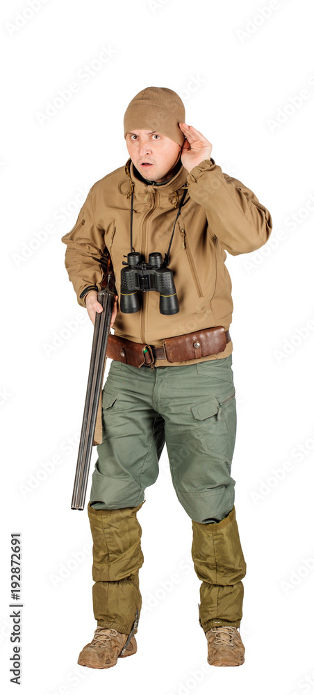 Full length portrait of a male hunter with double barreled shotgun ...