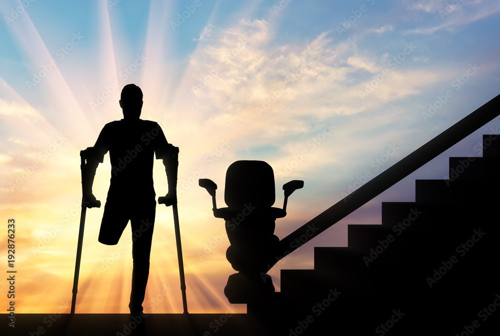 Disabled person without a leg with crutches and a lift for disabled ...