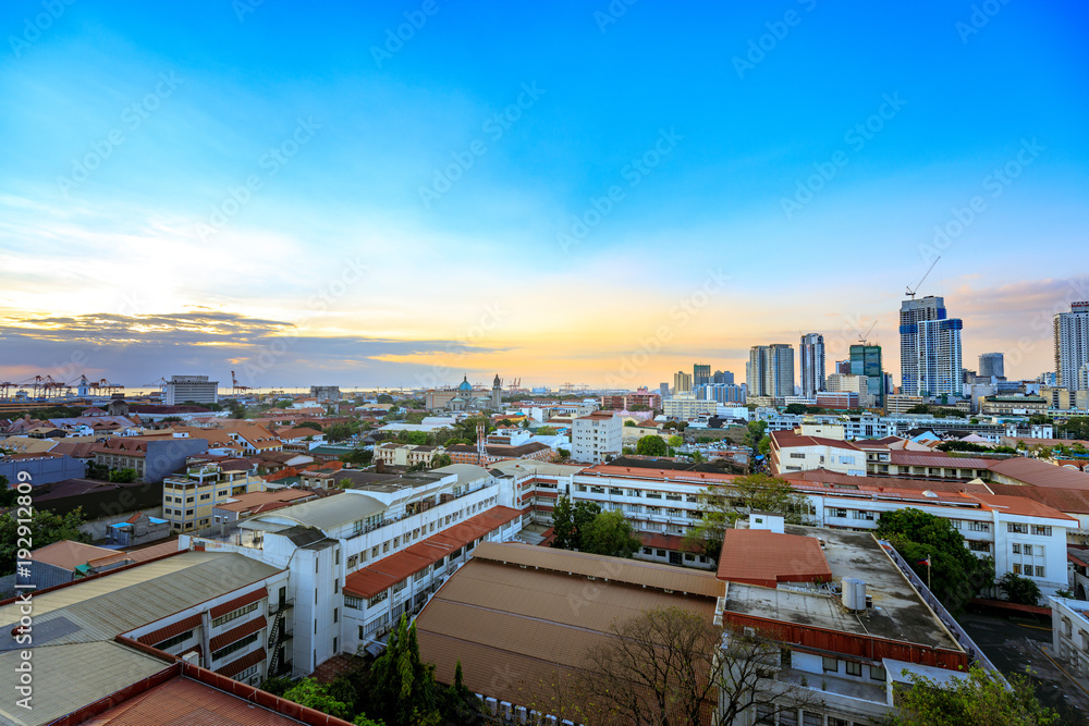 Manila city skyline in Philippines. Seen from Intramuros district ...