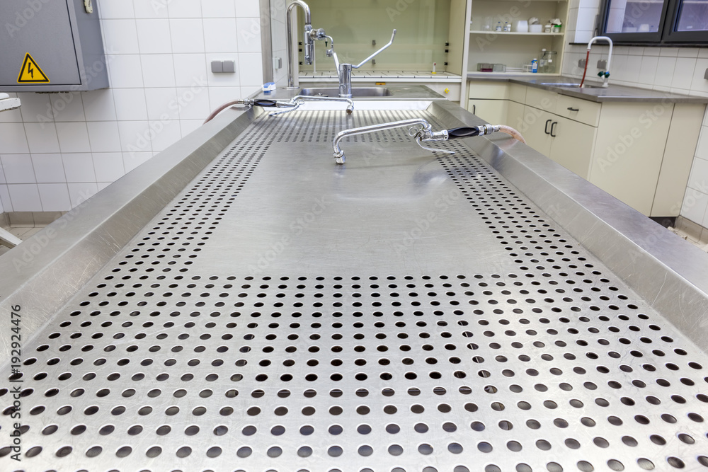 Autopsy tables in morgue Stock Photo | Adobe Stock