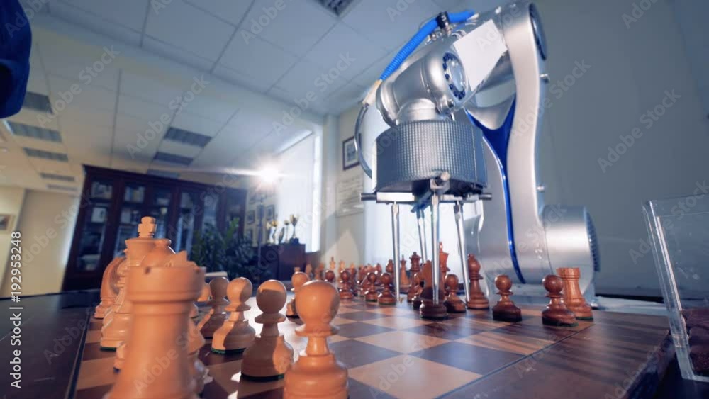 Artificial intelligence, robot chessplayer playing chess with a man. 4K ...