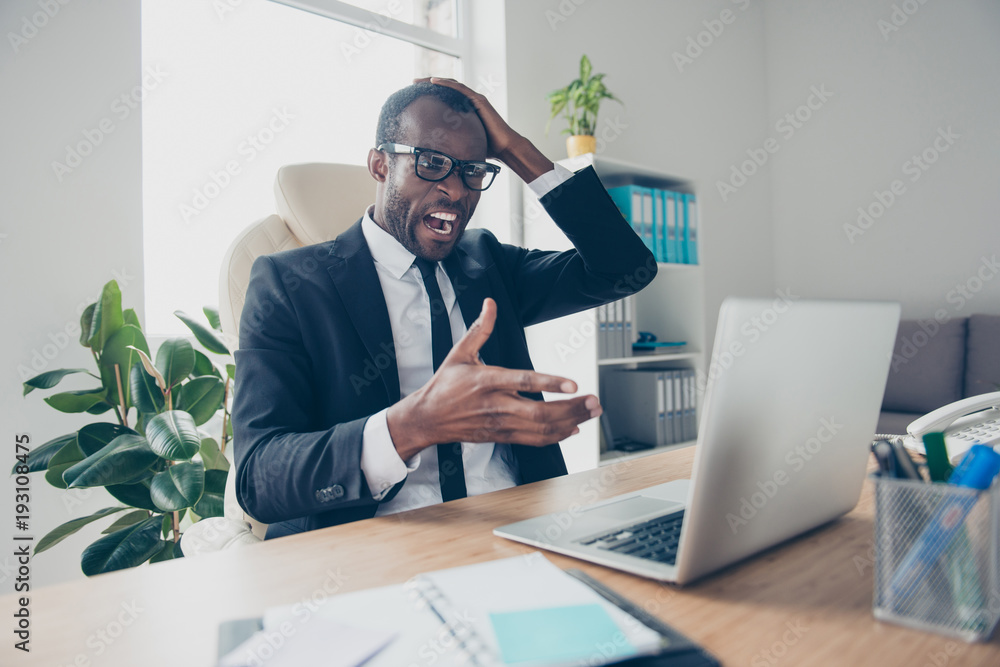 Attractive, negative, rage, crazy, mad, excited IT-specialist shouting ...