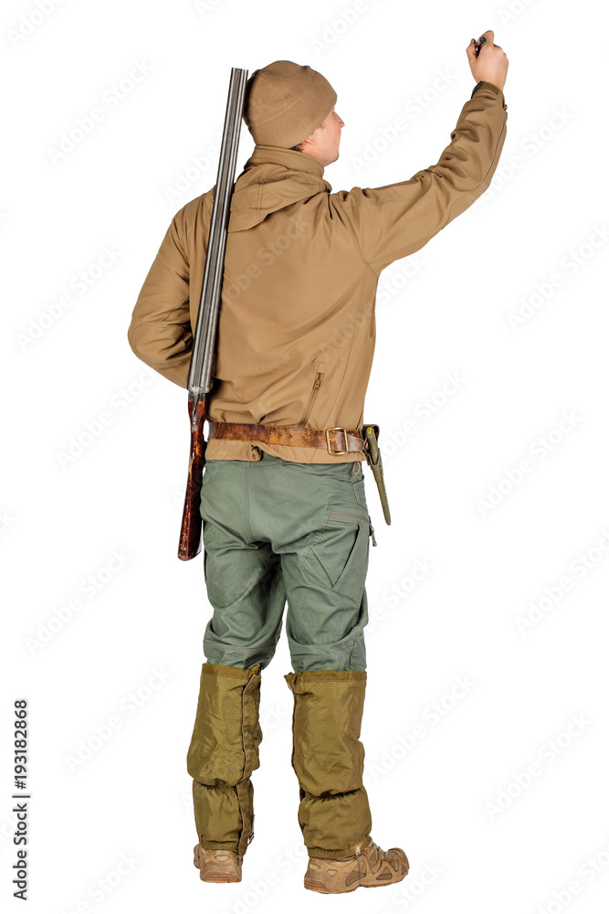 Full length portrait of a male hunter with double barreled shotgun ...